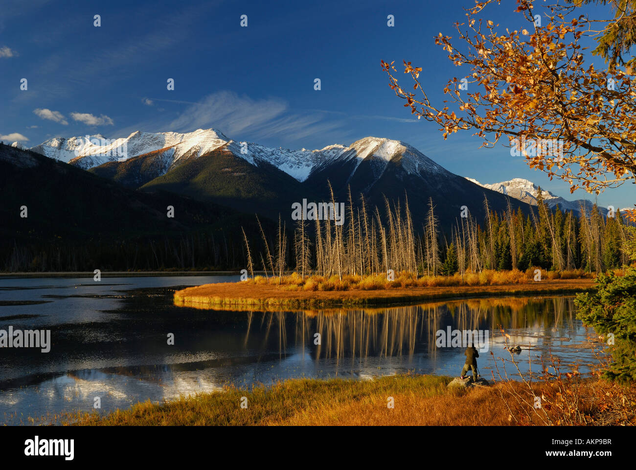 Photographer on First Vermilion Lake at sunrise in the Fall Sulphur ...
