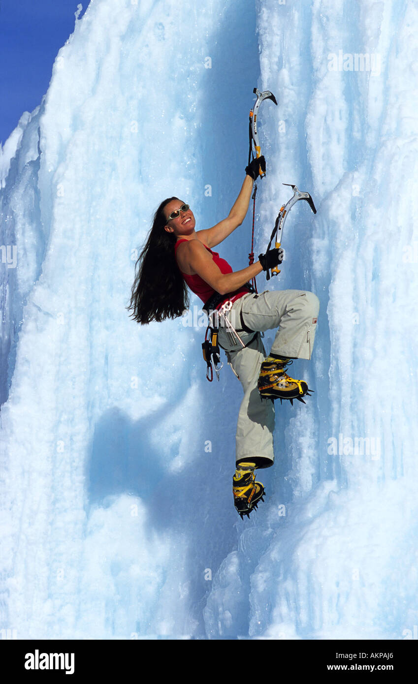 Woman ice climbing Stock Photo - Alamy