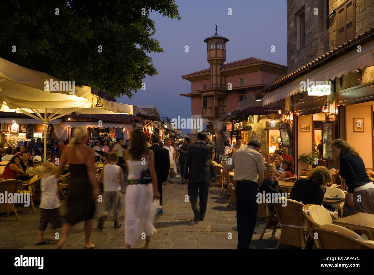 People strolling along shopping street Odos Sokratous passing a ...