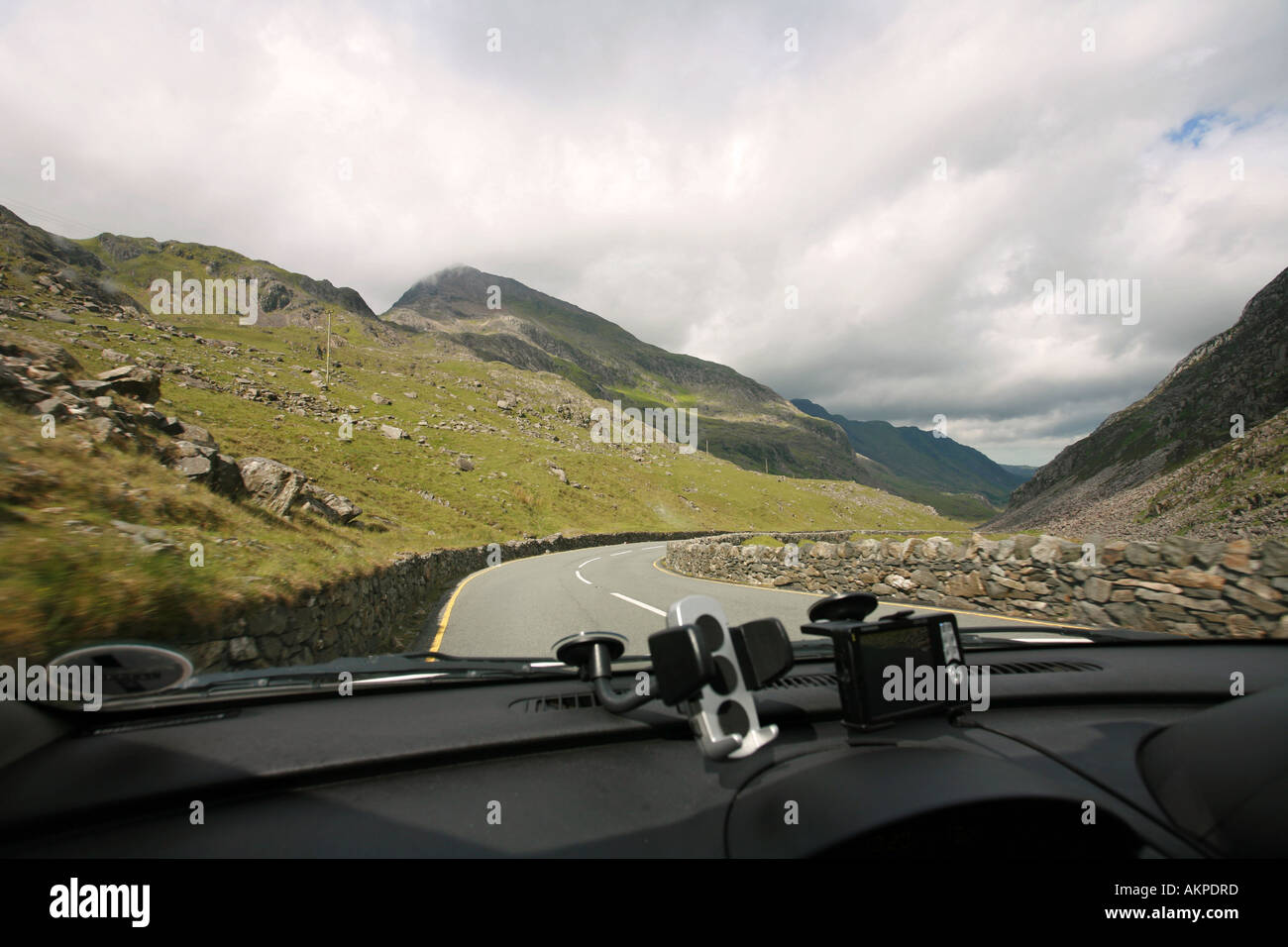 Snowdon mountain range viewed from inside a tourists car driving on the ...
