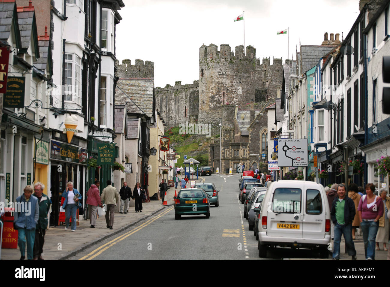 Ancient Conwy castle viewed from main street of Conwy town centre Stock ...