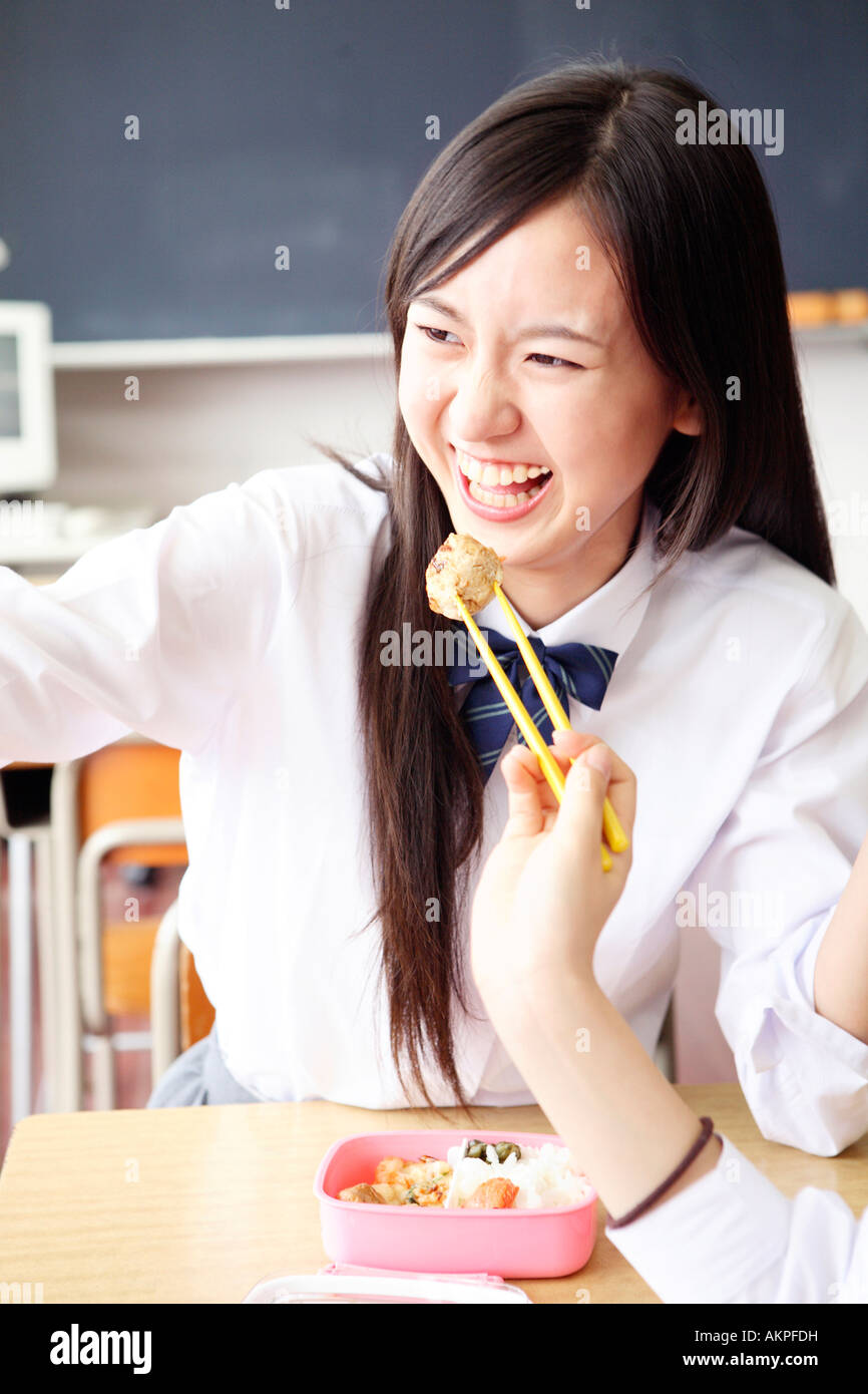 High school girls having lunch Stock Photo - Alamy