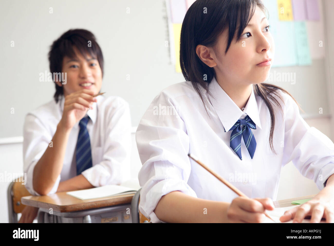 High school girl taking school lessons Stock Photo - Alamy