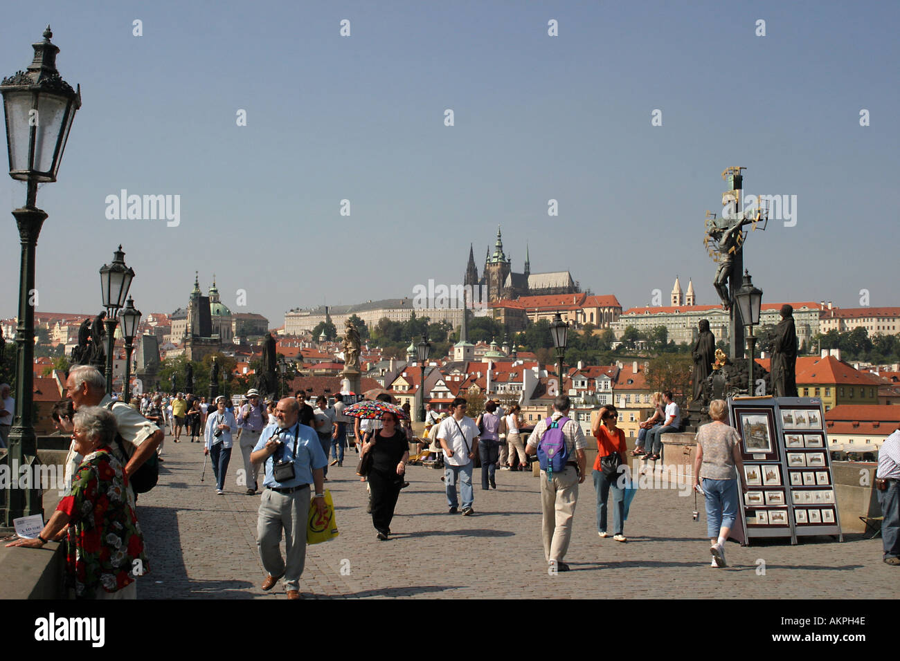 Charles Bridge at midday in Prague, Czech Republic showing the crowds ...