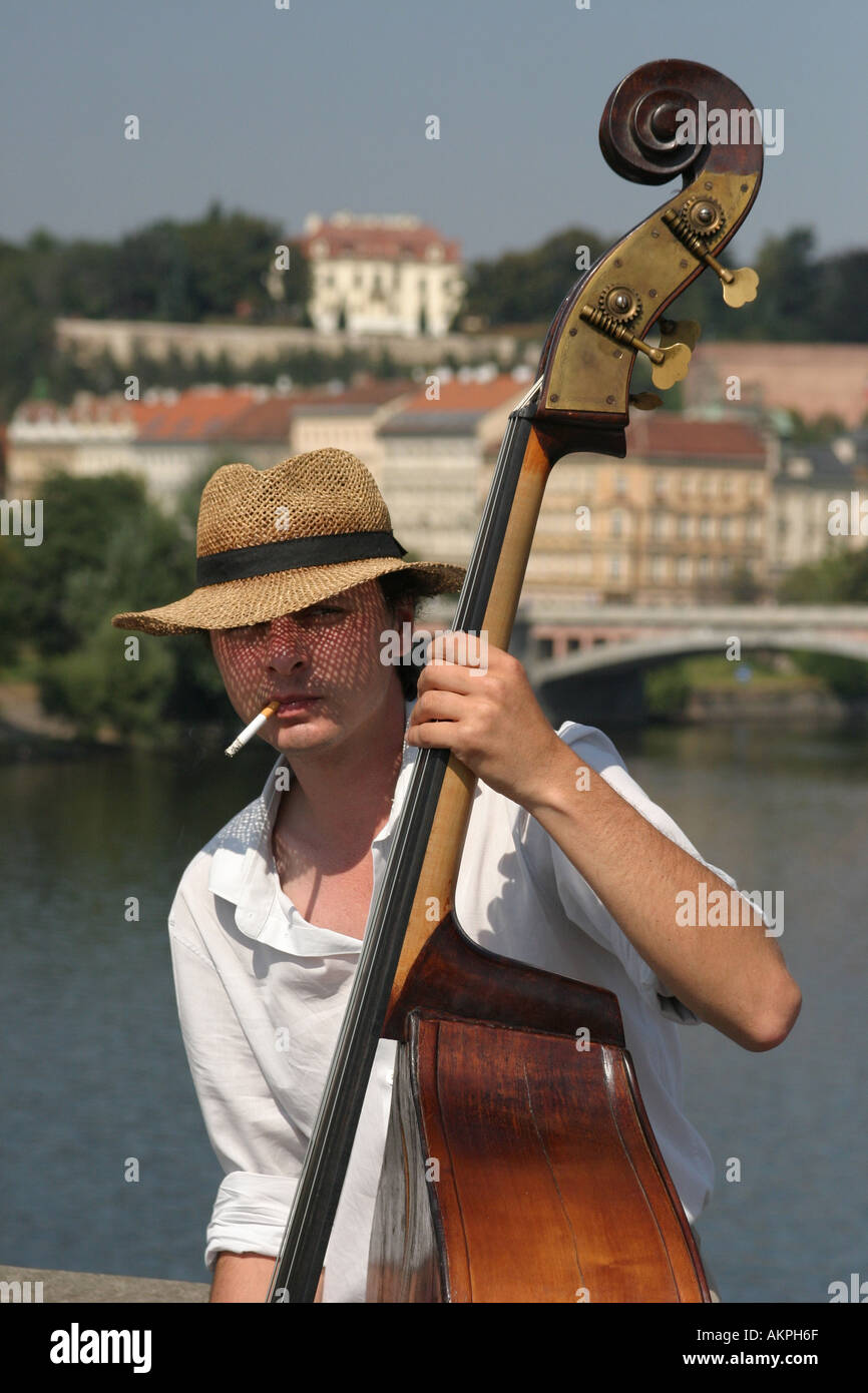 portrait of man playing a cello Stock Photo - Alamy
