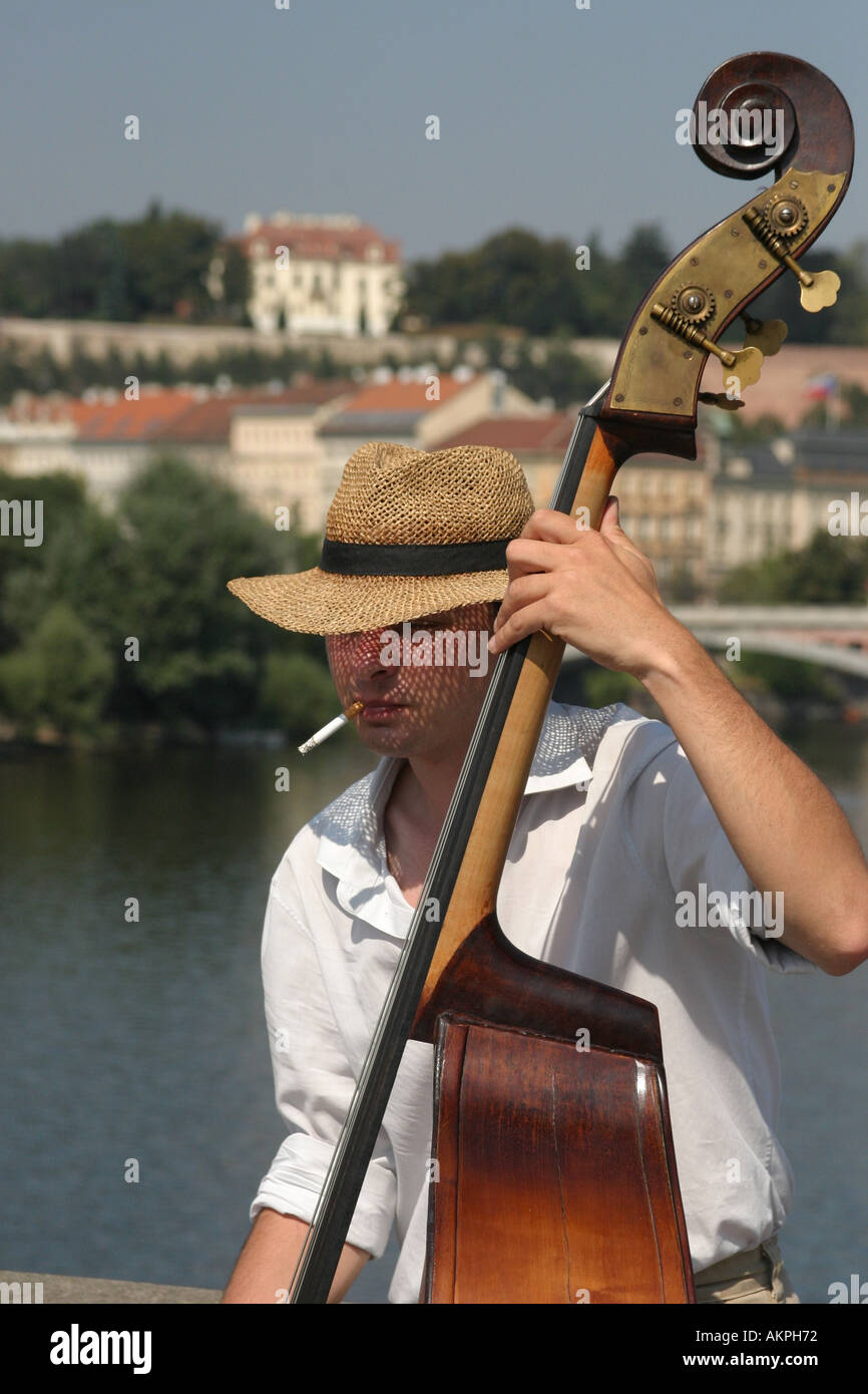 portrait of man playing a cello Stock Photo - Alamy