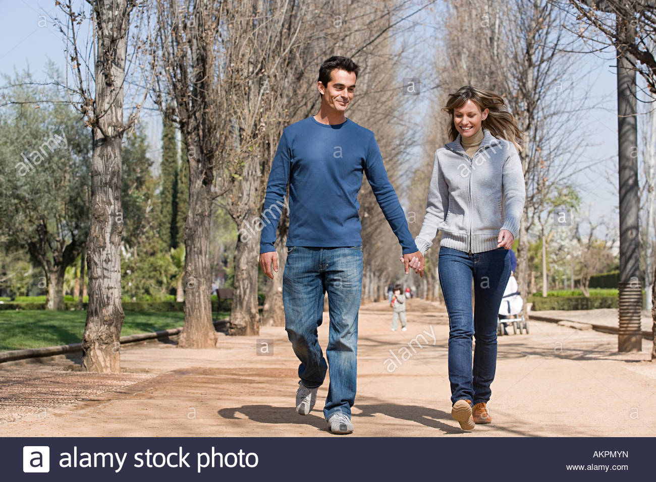 Couple Walking Hand In Hand Stock Photos & Couple Walking Hand In Hand ...