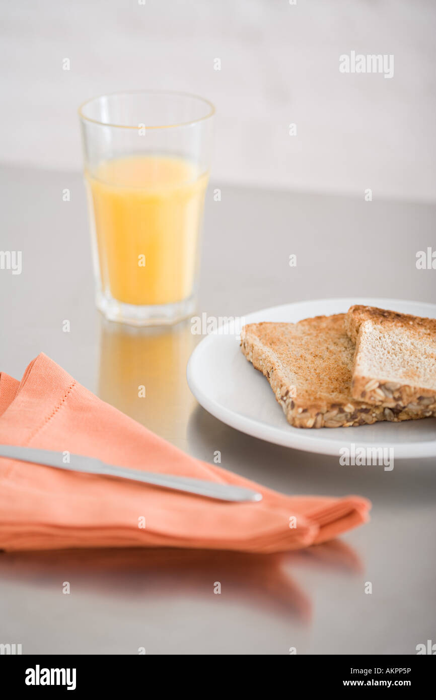 Toast and a glass of orange juice Stock Photo - Alamy