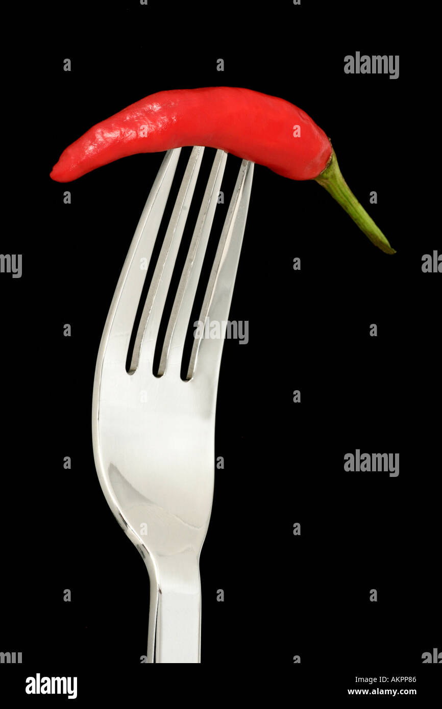 Red Chilli on Fork Stock Photo - Alamy