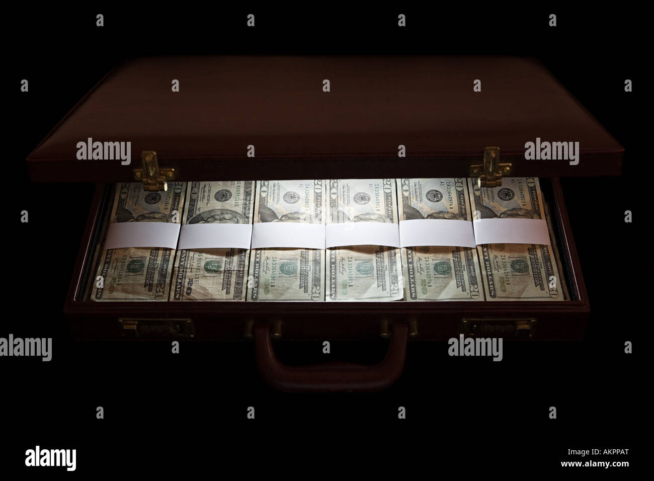 A briefcase filled wih banknotes Stock Photo - Alamy