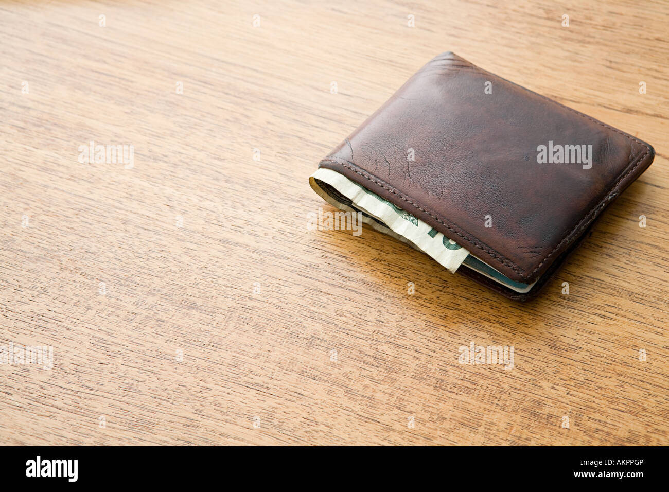 Ten dollar note in a wallet Stock Photo - Alamy