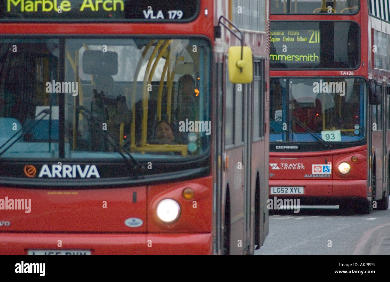 Two red double decker buses in London England Stock Photo - Alamy