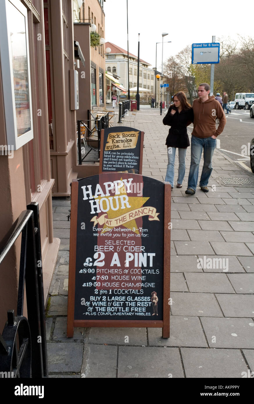 Happy Hour sign outside a bar UK Stock Photo - Alamy