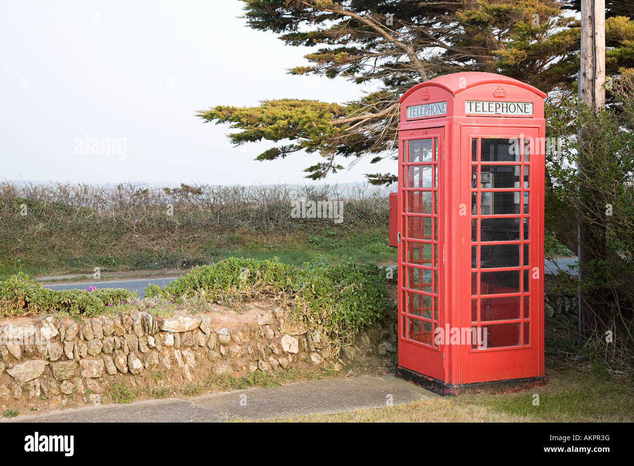 Red telephone box in rural setting Stock Photo - Alamy