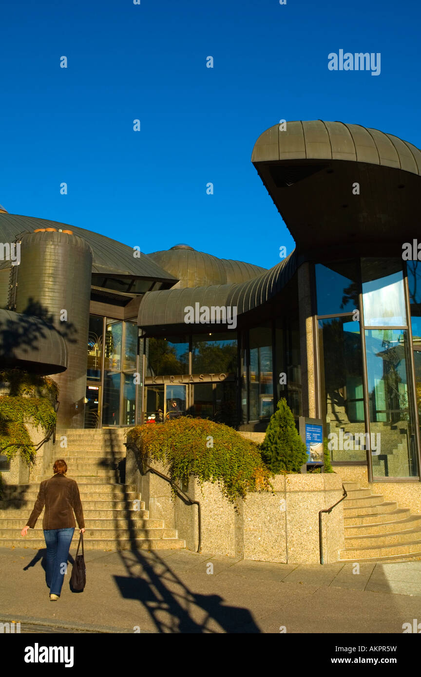 Woman walking into Metso the main library in central Tampere Finland EU ...