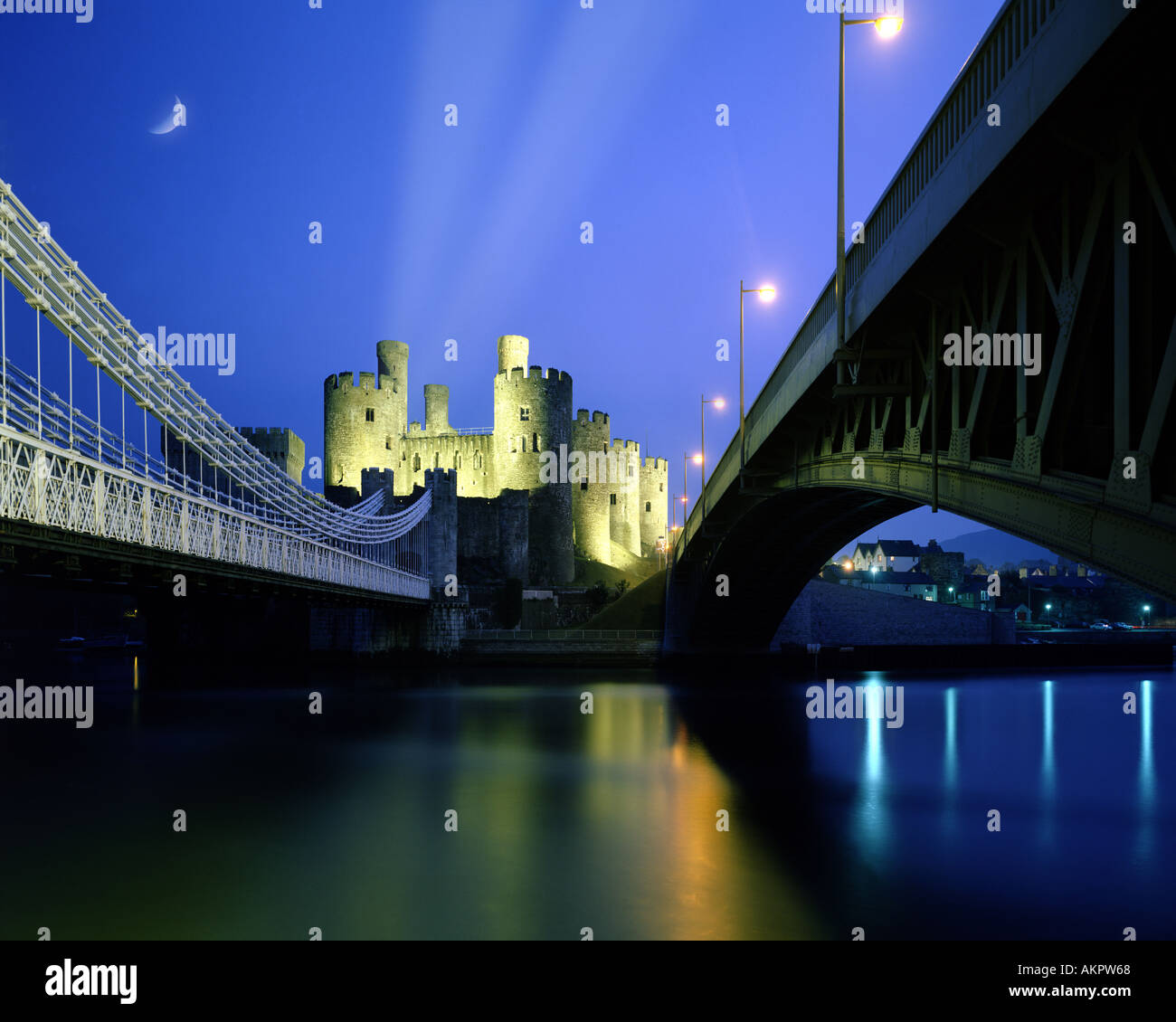 GB - WALES: Conwy Castle and Telford Bridge by night Stock Photo - Alamy