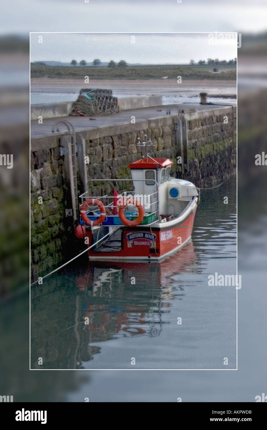 Fishing Boat In Beadnell Harbour Stock Photo - Alamy
