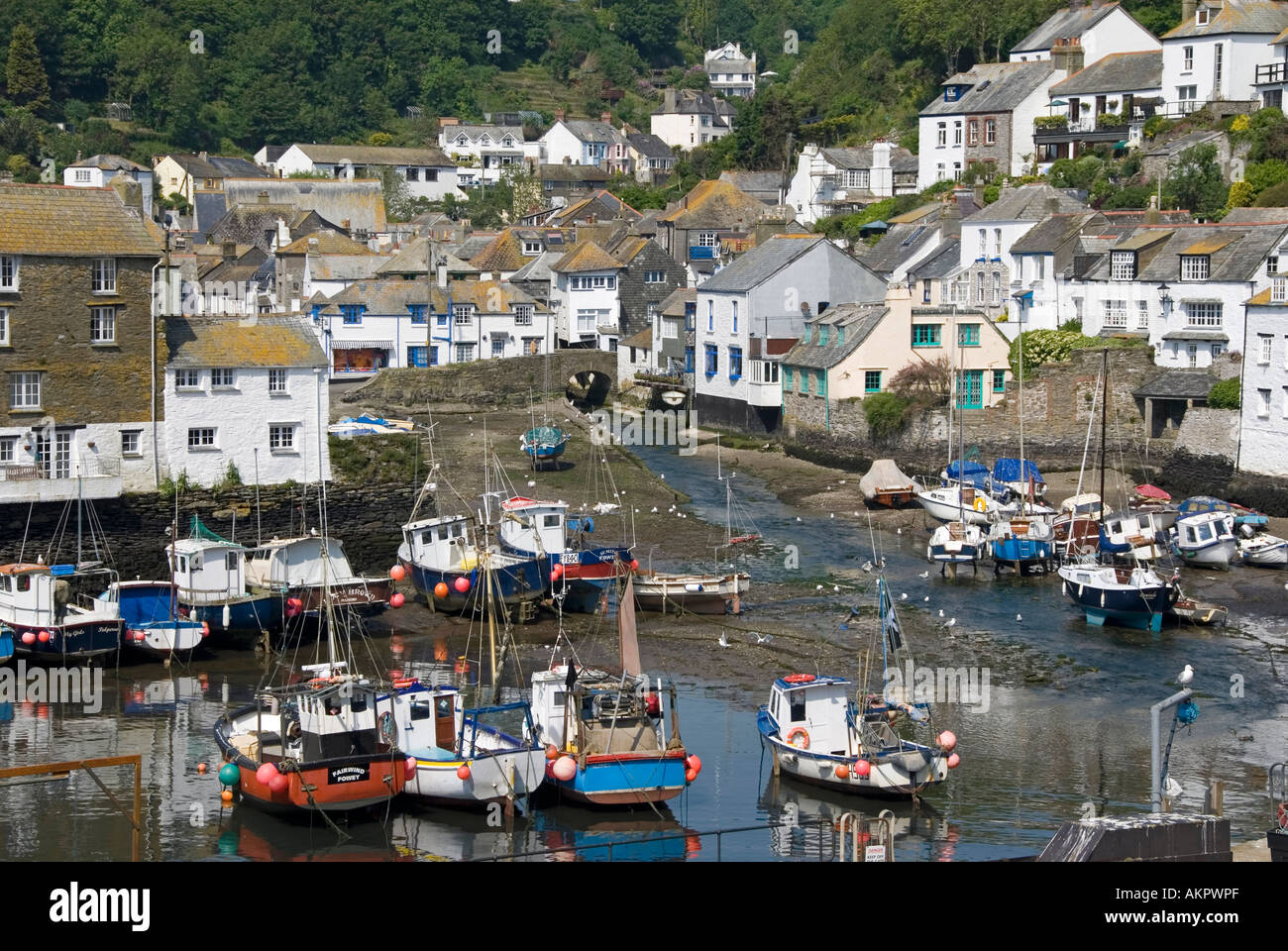 Iconic English coastal village landscape & white hillside cottages ...