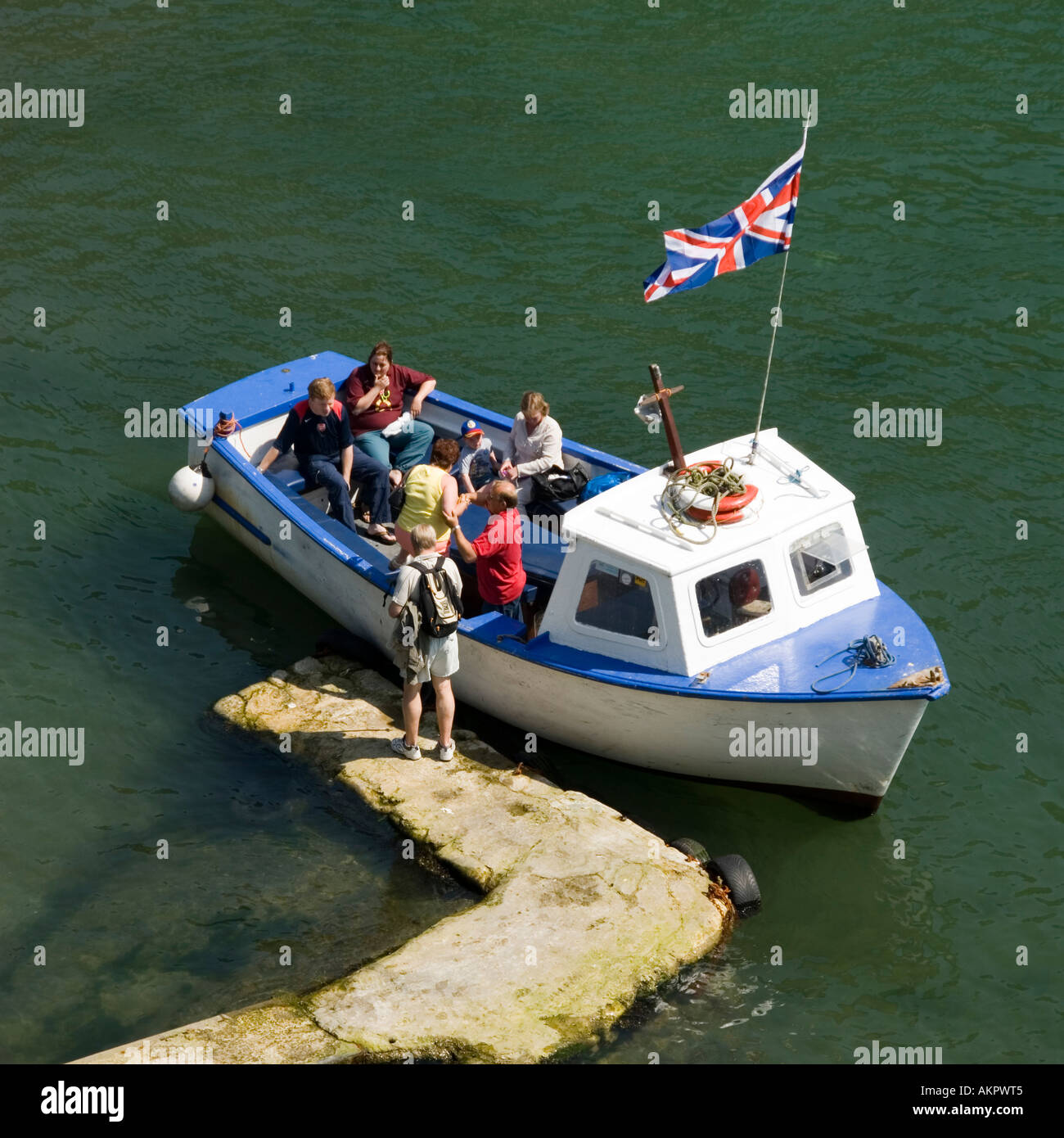 Coastal Cornish village on River Pol tourism people from above boarding ...