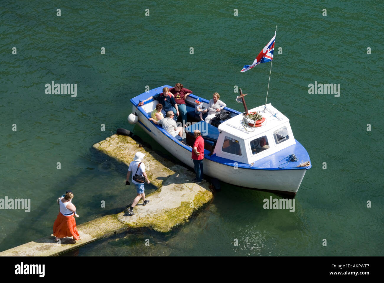 Coastal Cornish village on River Pol tourism people from above boarding ...