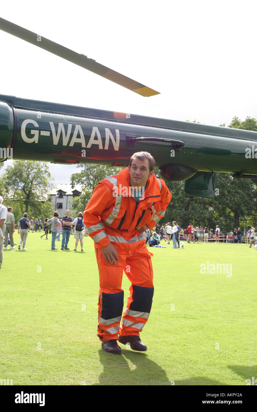 paramedic walking under the rotor of an air ambulance Stock Photo - Alamy