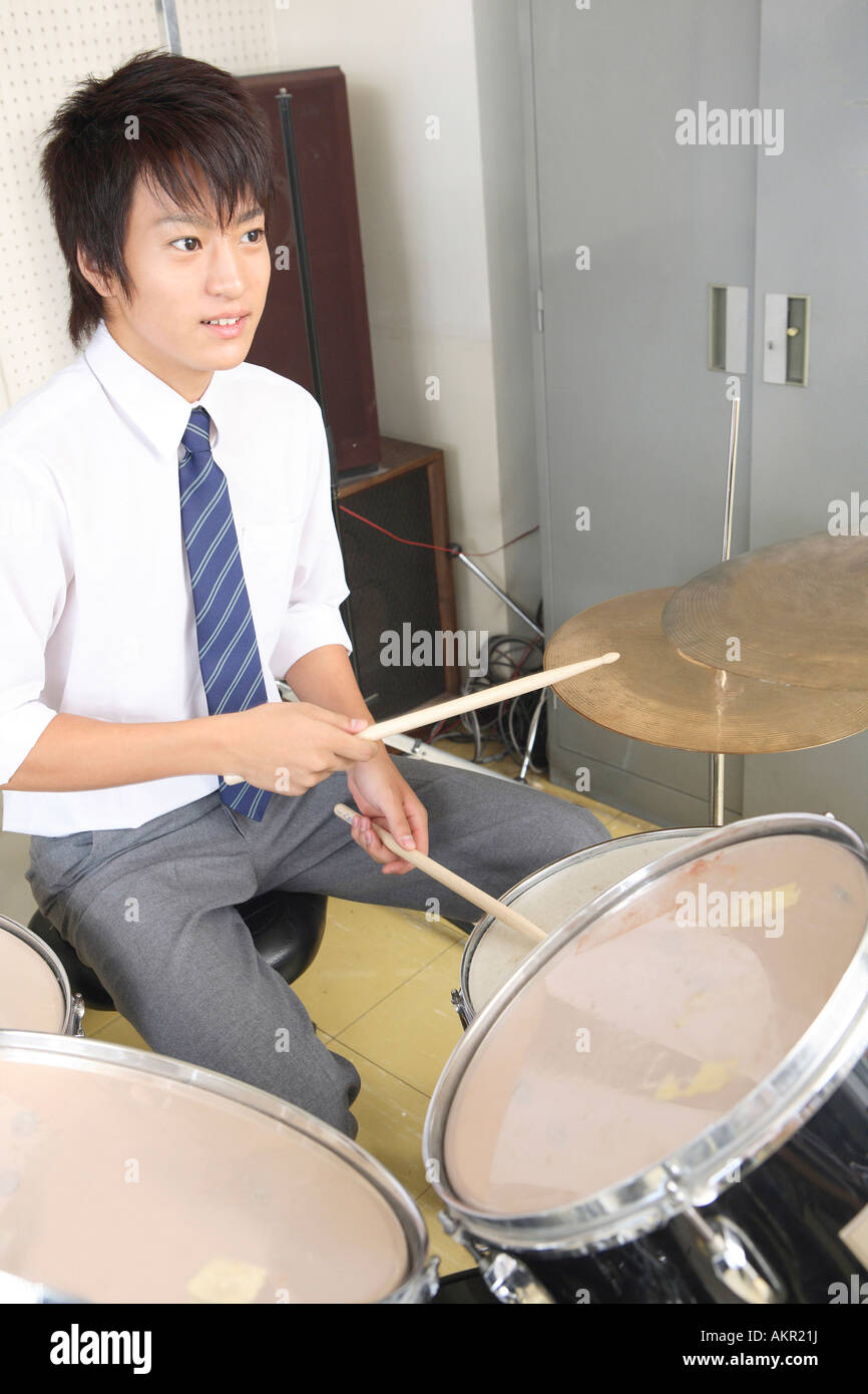 Man beating a drum hi-res stock photography and images - Alamy