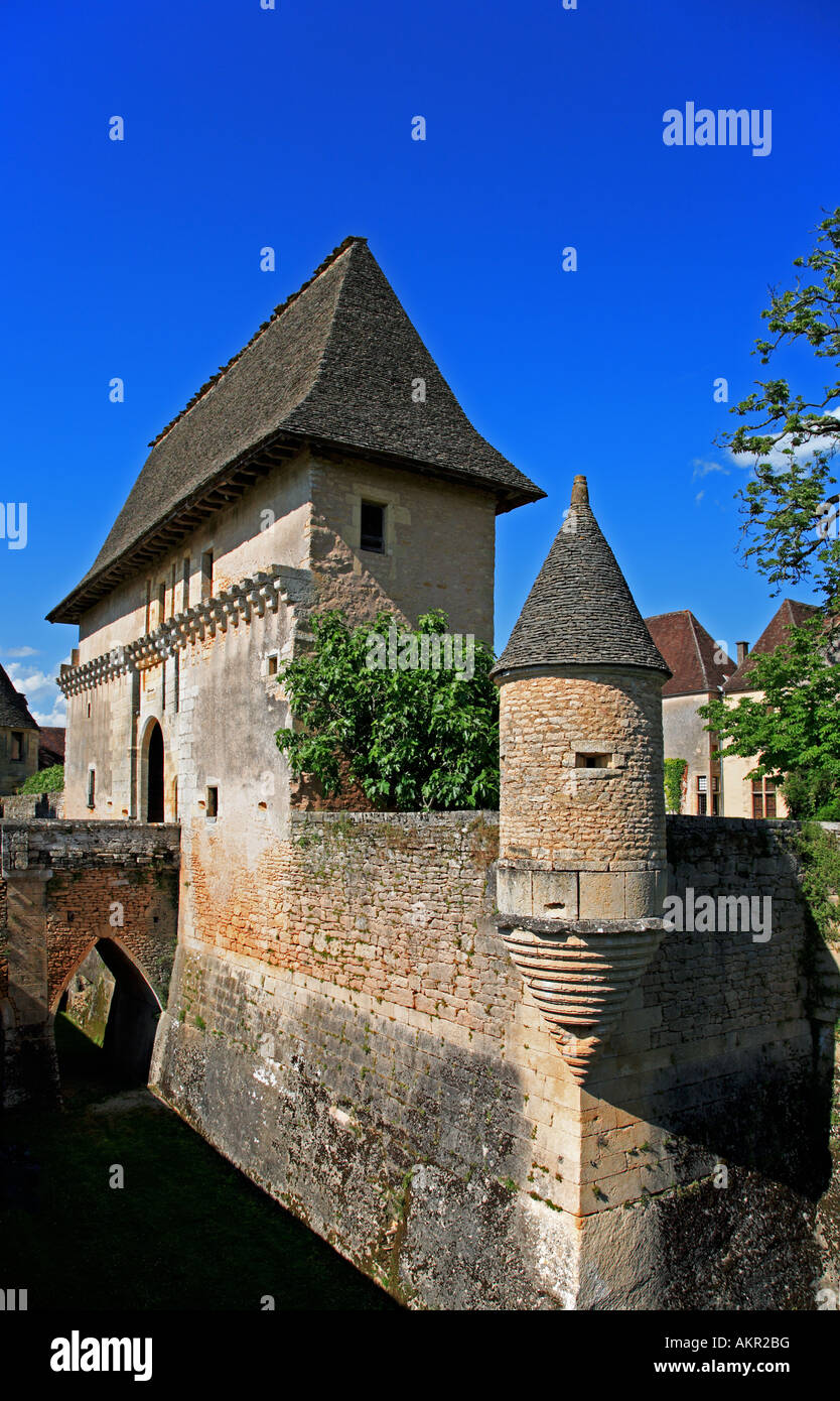 Fortified gatehouse and corner turret at the Château de Losse Stock ...