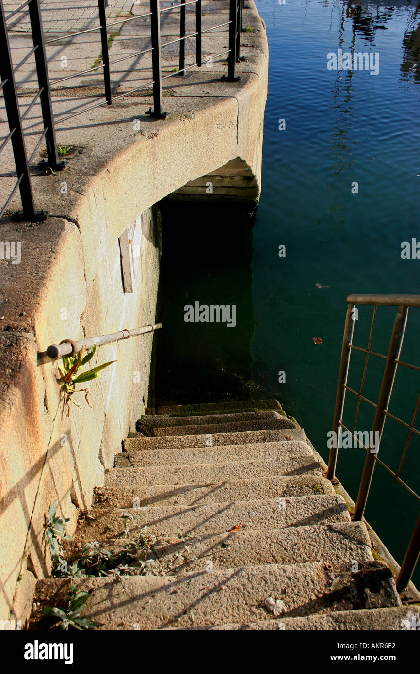 Steps in harbour wall Stock Photo - Alamy