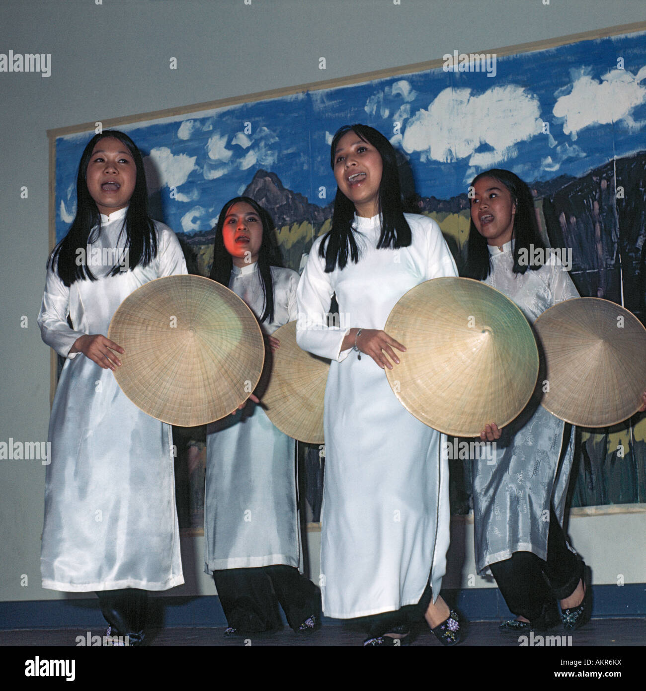Asia, Viet Nam, folk dance group in traditional costumes, young girls ...
