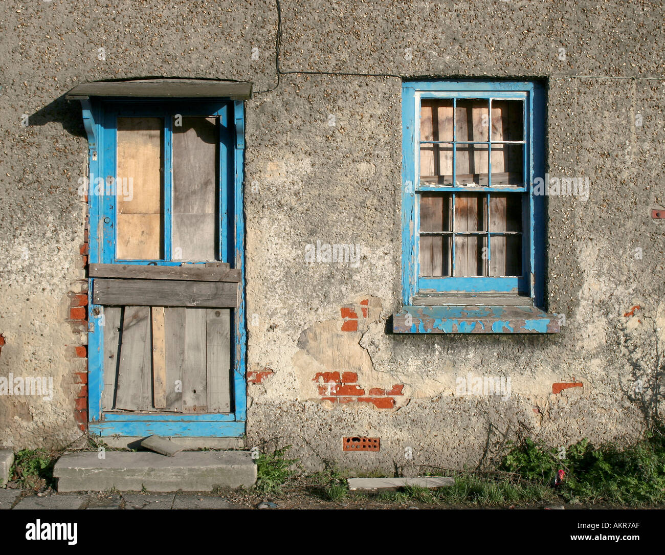 Door and window in derelict building Stock Photo - Alamy