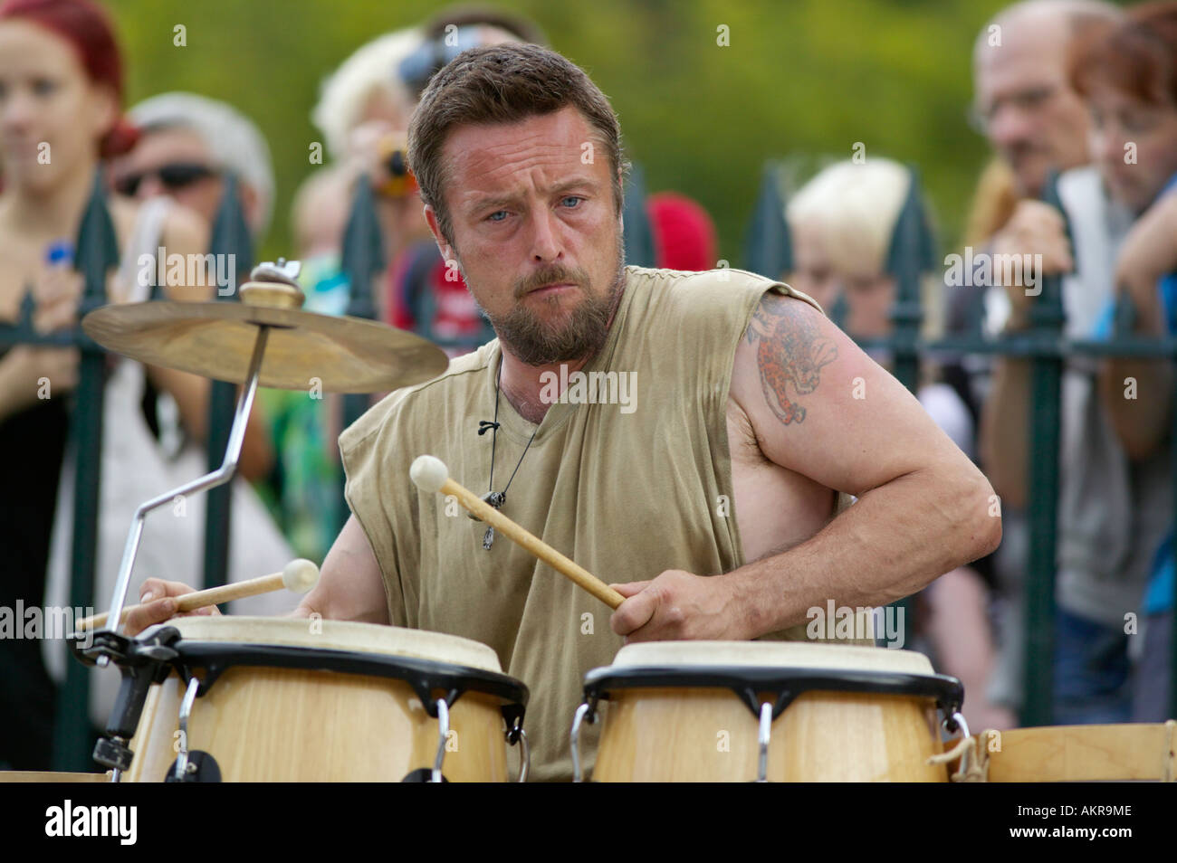 Wayne Manning of the folk group Clann an Drumma playing the drums at ...
