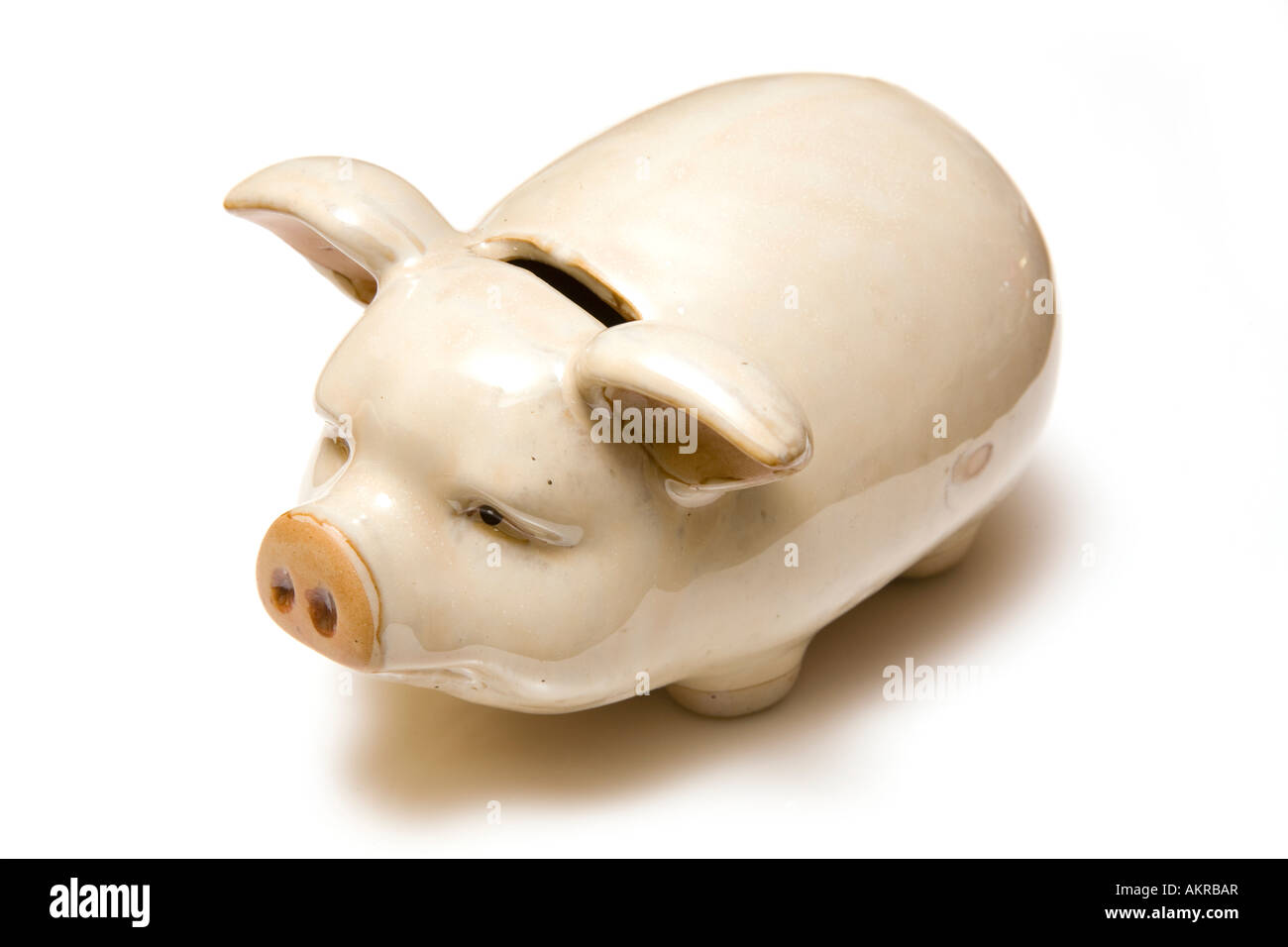 Piggy bank style money box isolated on a white studio background Stock ...