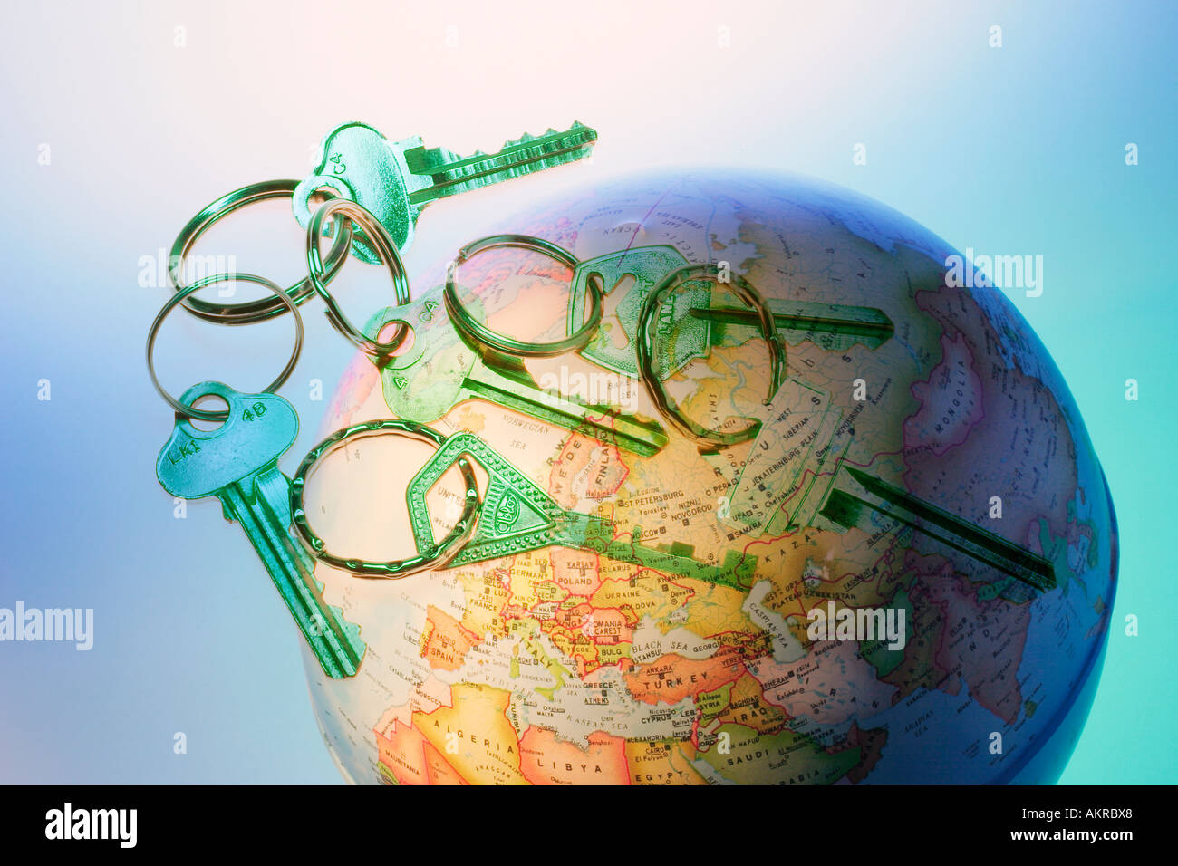 Keys and Globe Stock Photo - Alamy
