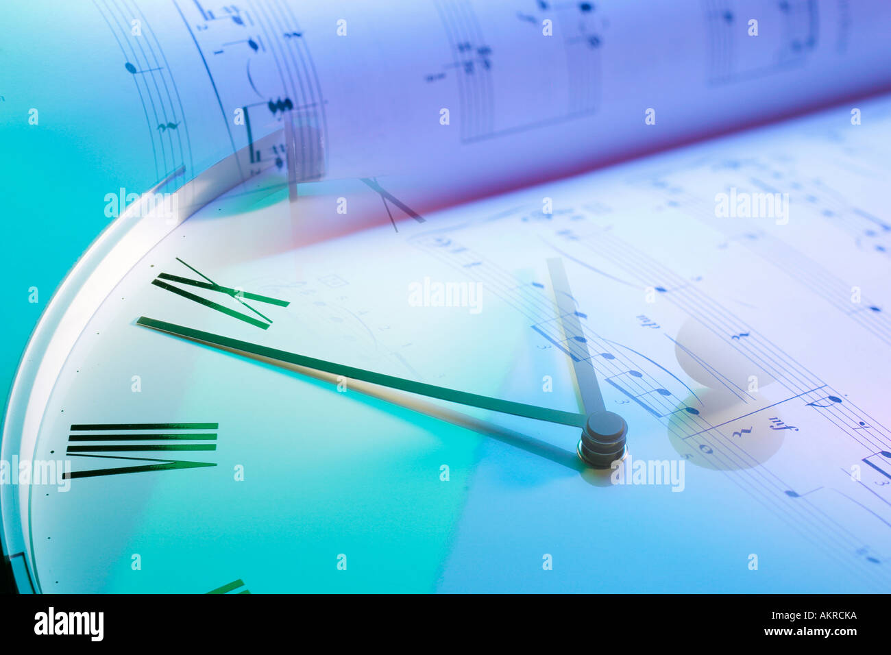 Clock and Music Score Stock Photo - Alamy