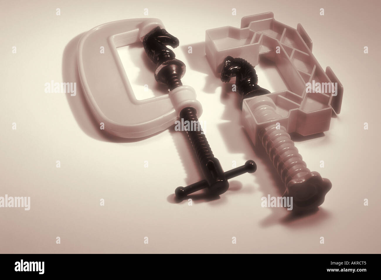 Toy Plastic Clamps with Chess Pieces Stock Photo - Alamy