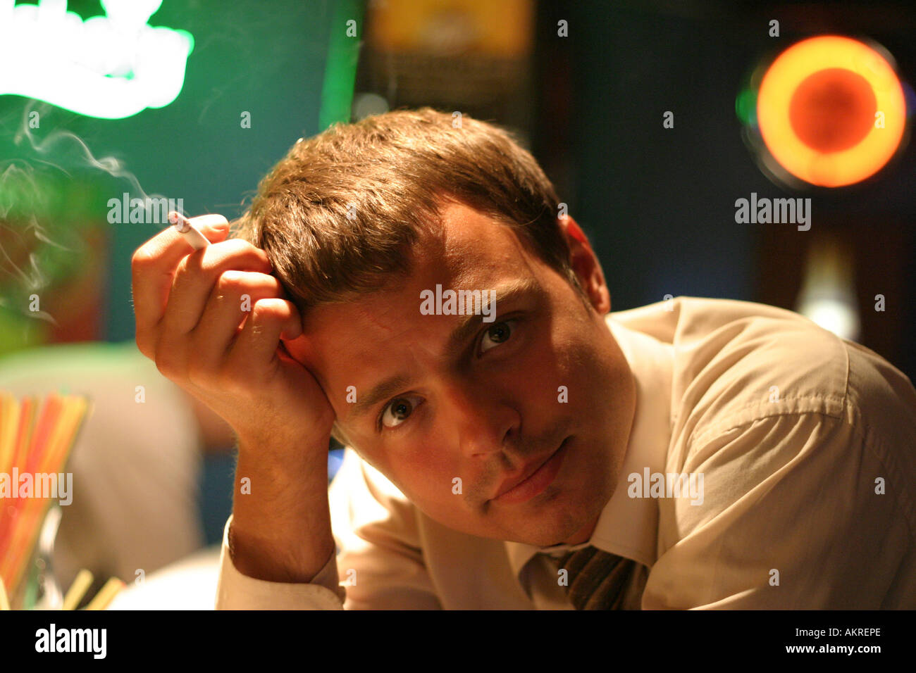 Young blond man smoking in hi-res stock photography and images - Alamy