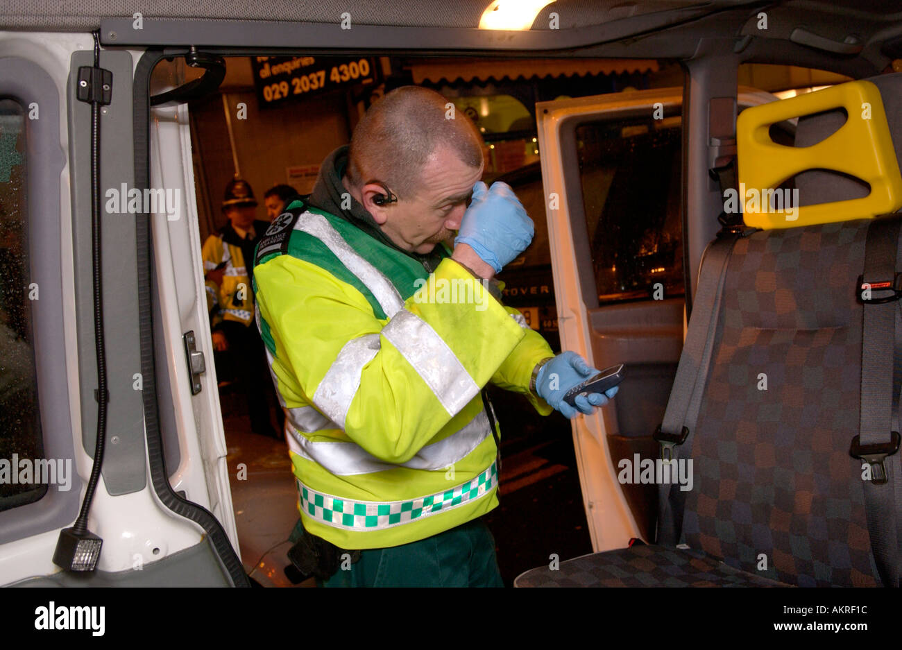 Paramedic on cell phone hi-res stock photography and images - Alamy