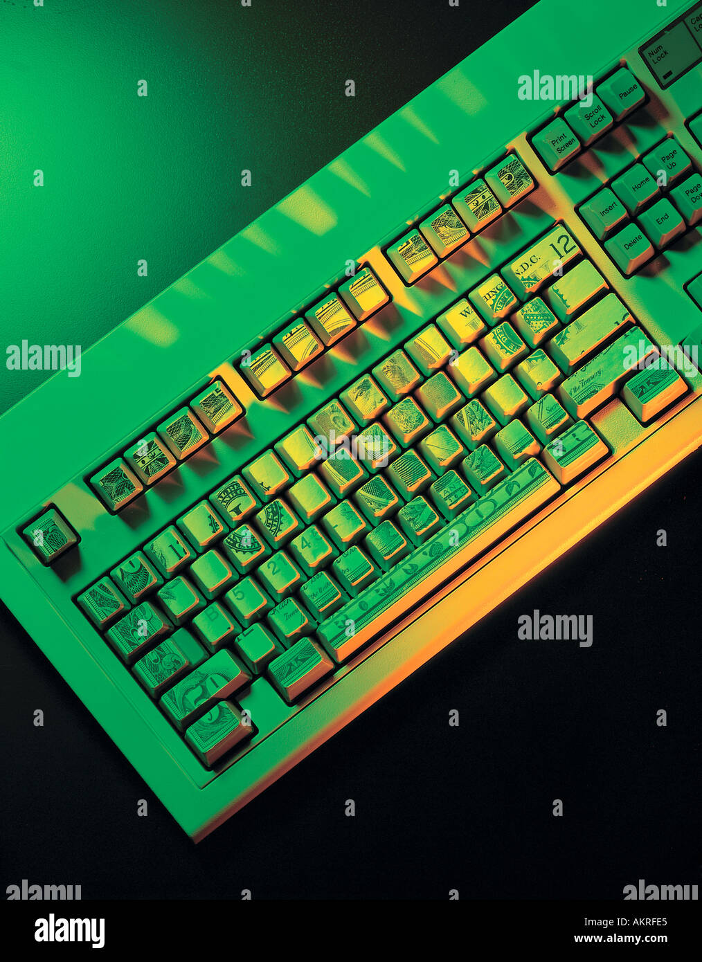 computer keyboard with american 50 dollar bill cut out on keys Stock ...