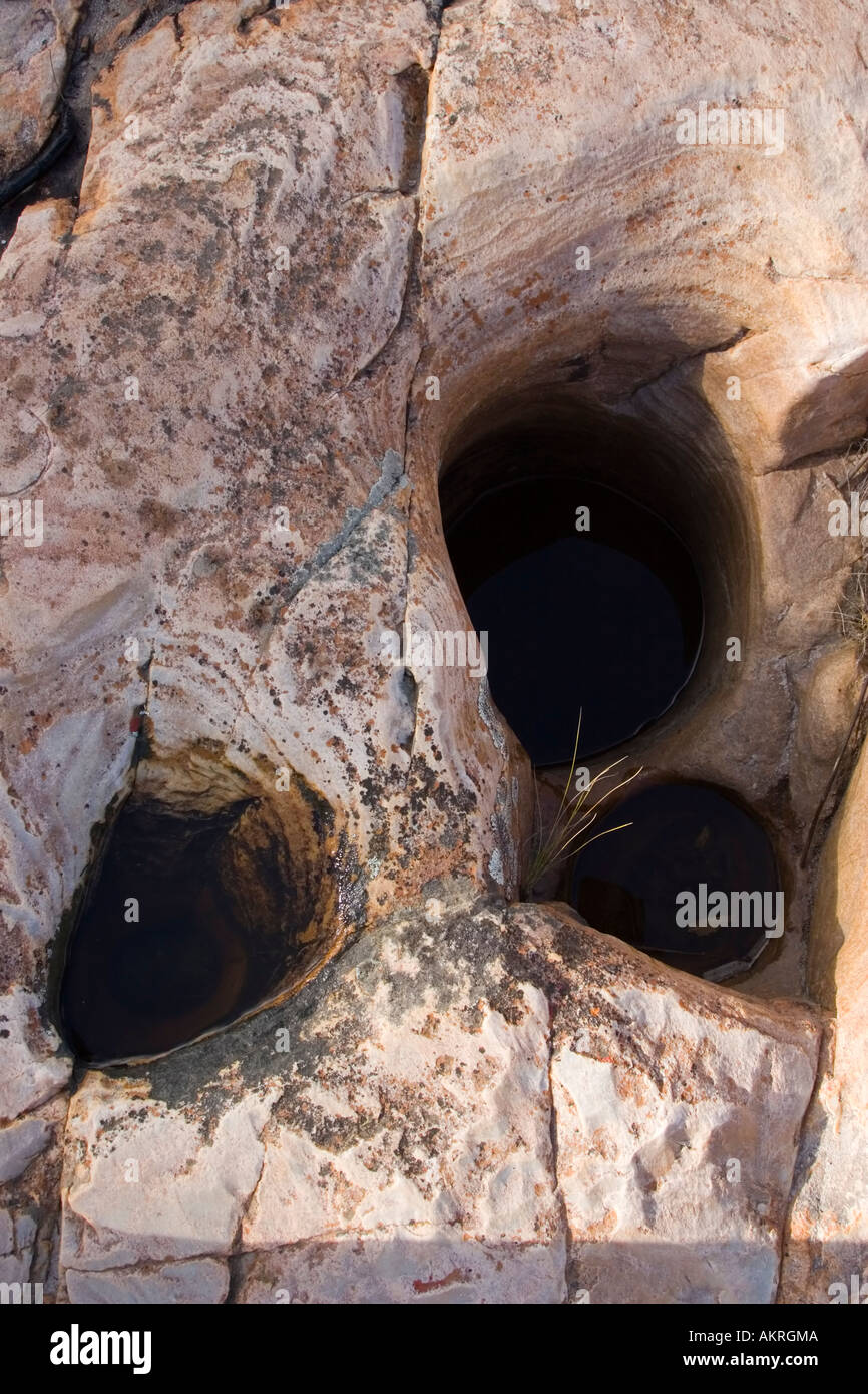 The power of water - holes made in the rocks by smaller rocks that were ...