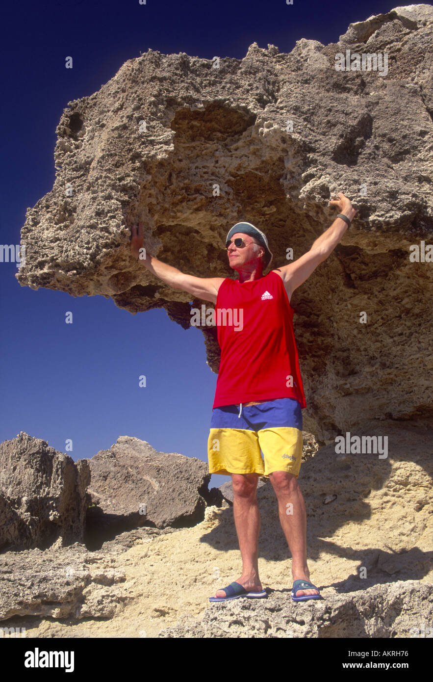 Person under rock overhang hi-res stock photography and images - Alamy