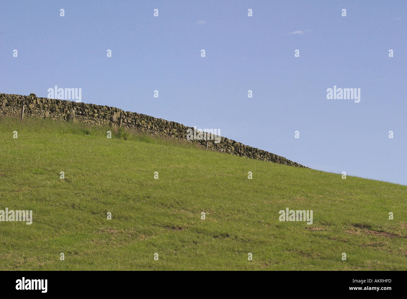 old traditional wall running through the middle of a field Stock Photo ...