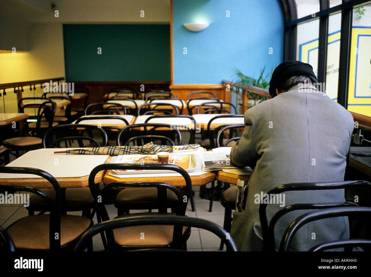Lone man eating hi-res stock photography and images - Alamy