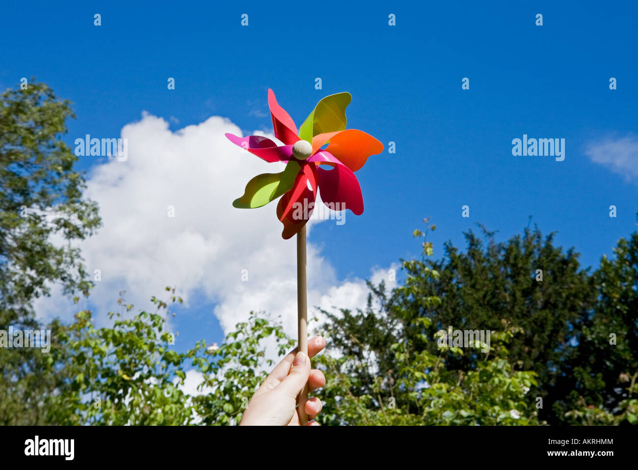A person holding a pinwheel Stock Photo - Alamy