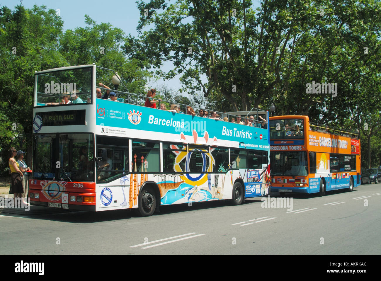 Barcelona open top tour buses Stock Photo - Alamy