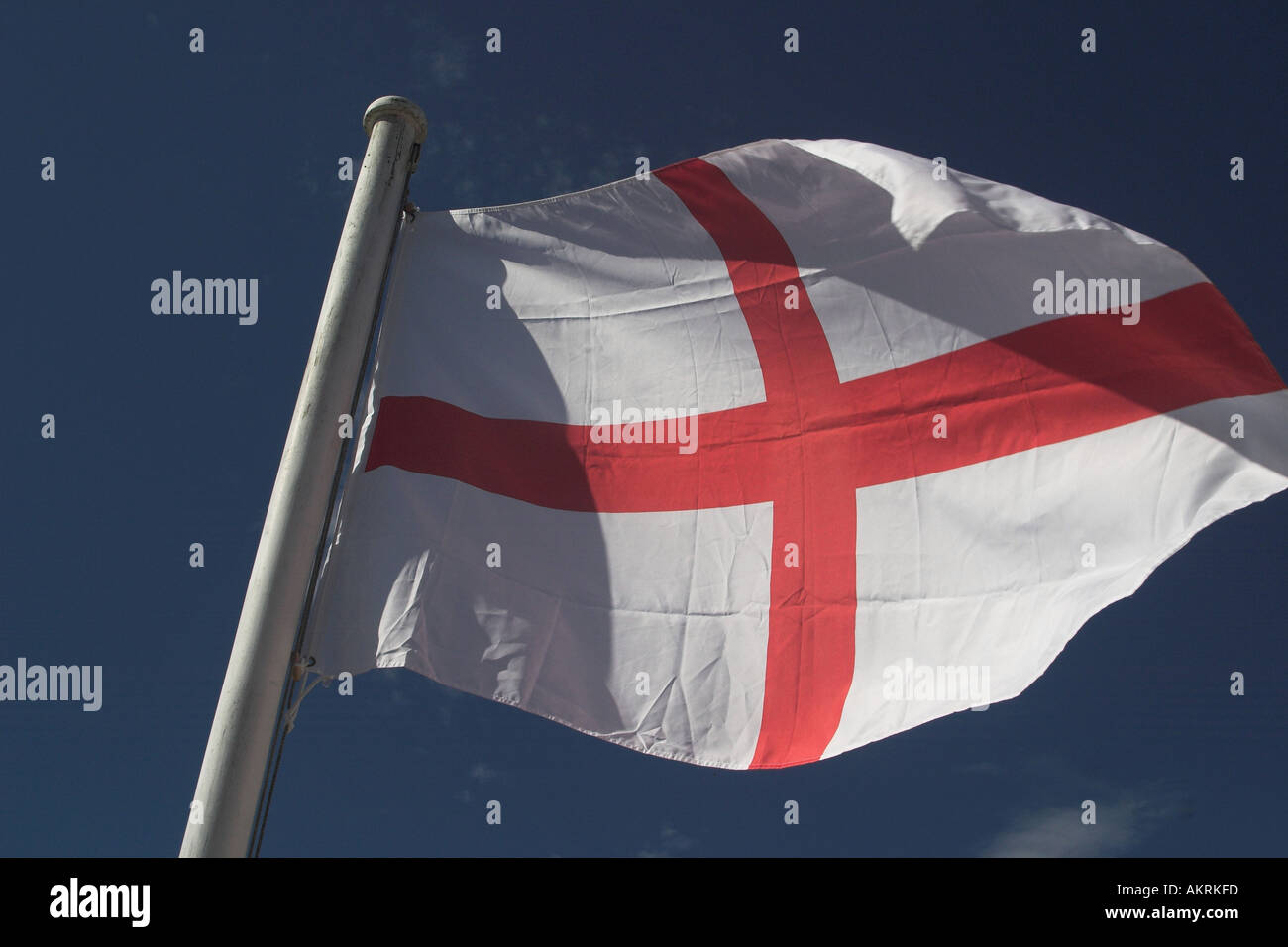 english flag blowing in the wind Stock Photo - Alamy