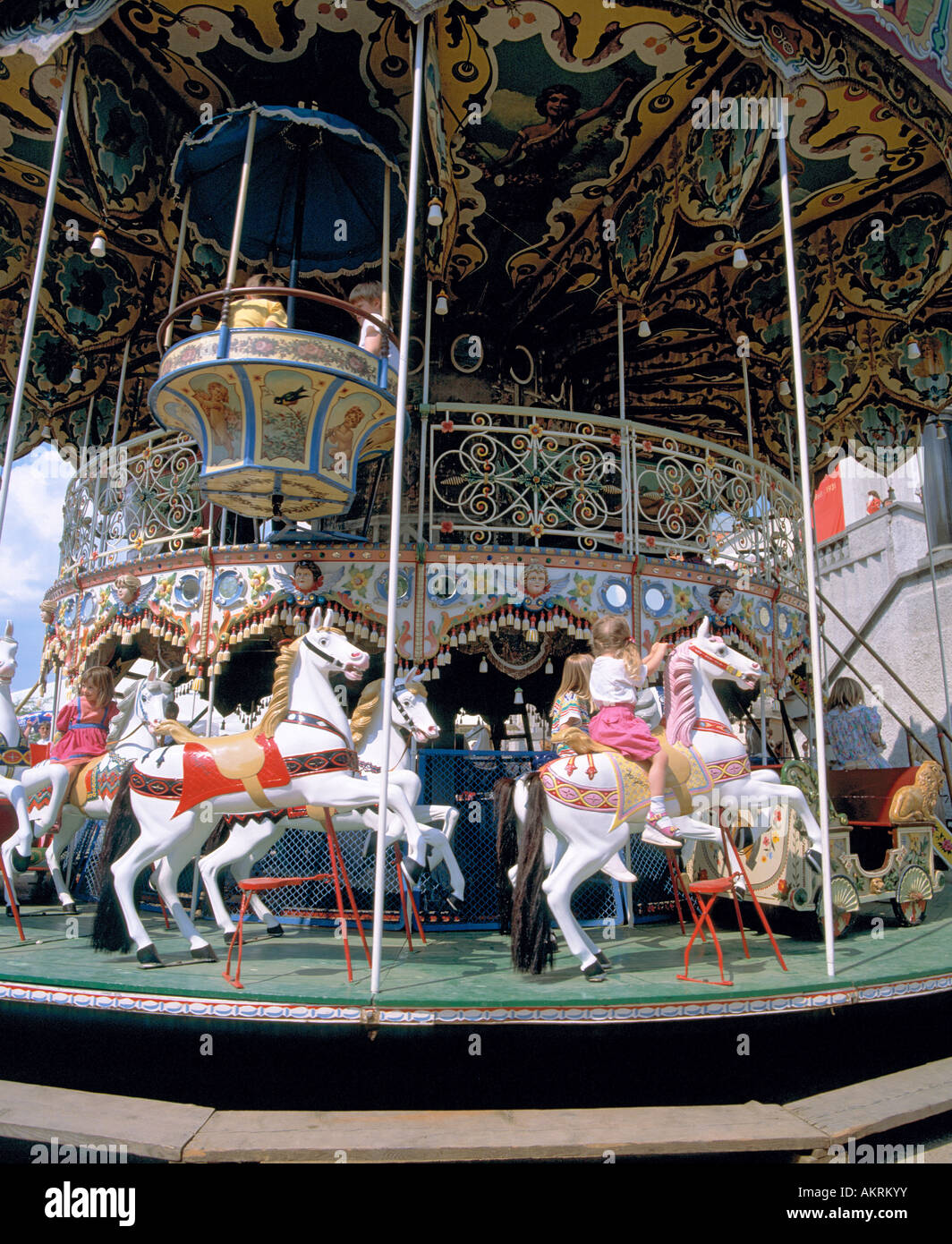 Children fairground carousel horses hi-res stock photography and images ...