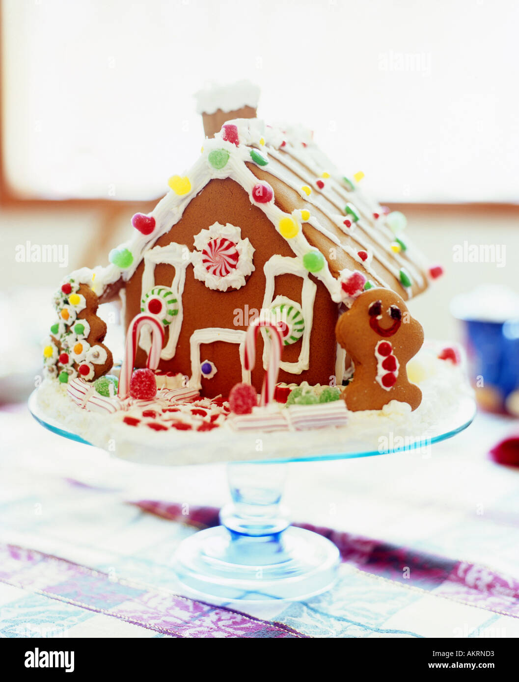Gingerbread house with candy canes hi-res stock photography and images ...