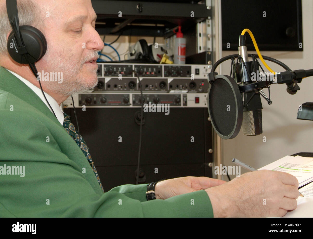 working in recording studio speaker reading for an audio book Stock ...