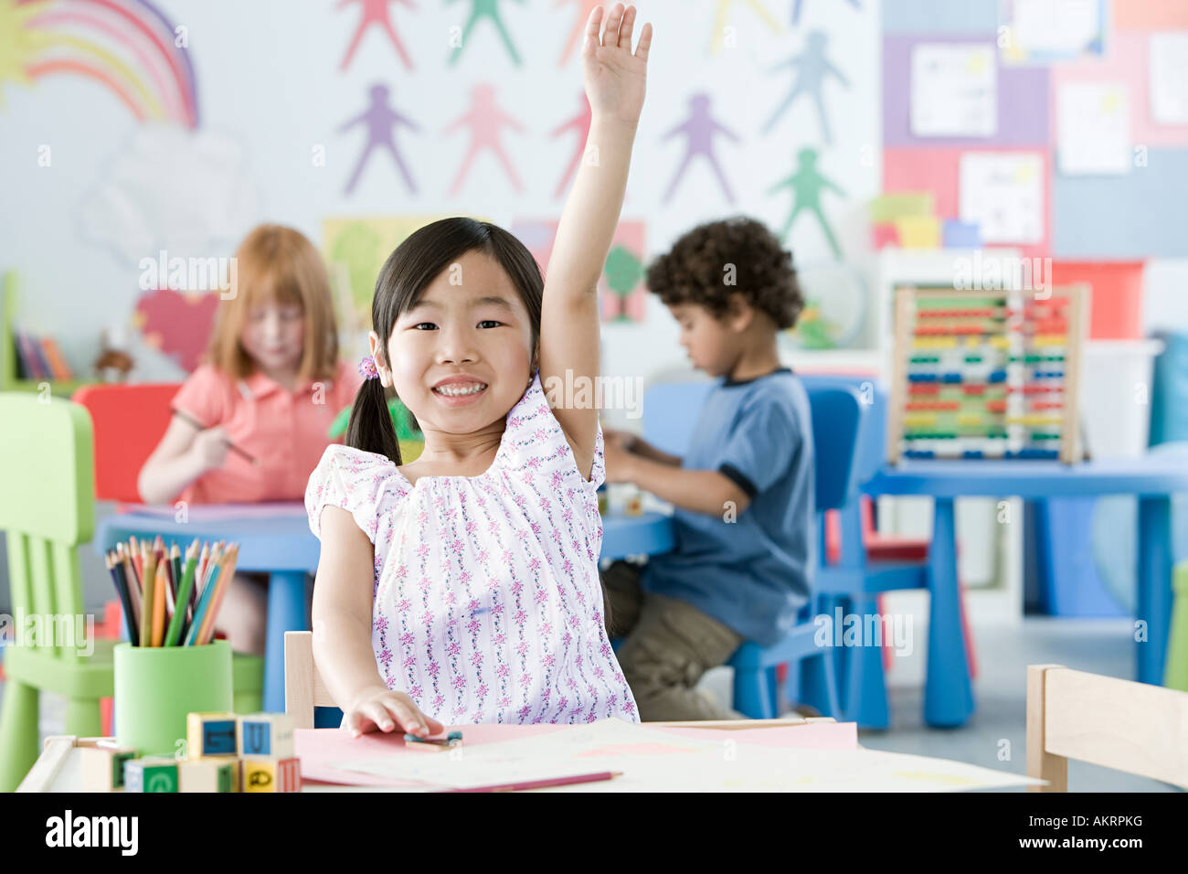 Girl raising arm Stock Photo - Alamy