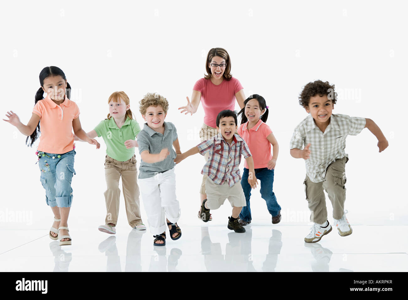 Girl chasing boy indoors hi-res stock photography and images - Alamy